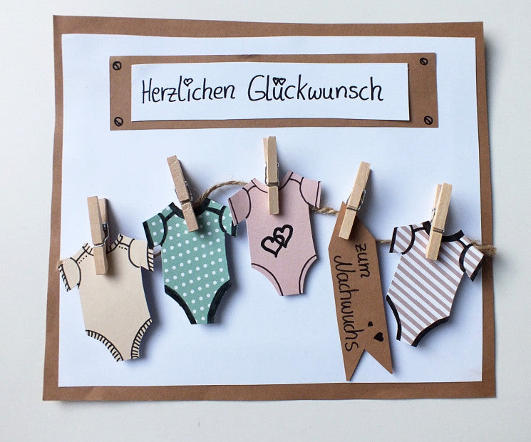 Mit kreativen Karten Glückwünsche zur Geburt überbringen. Geschenke.de